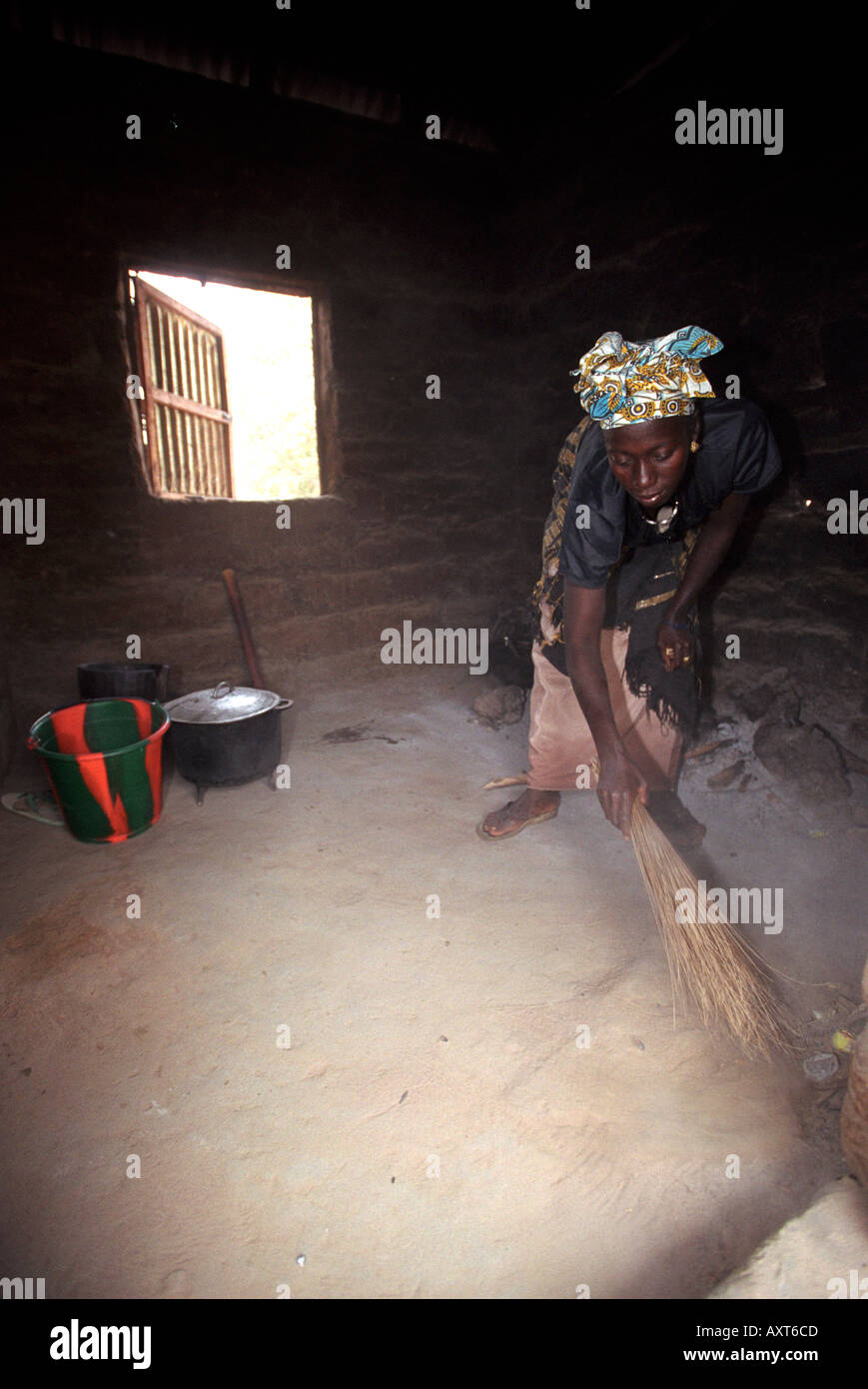 An African woman cleaning her house in The Gambia West Africa Stock ...