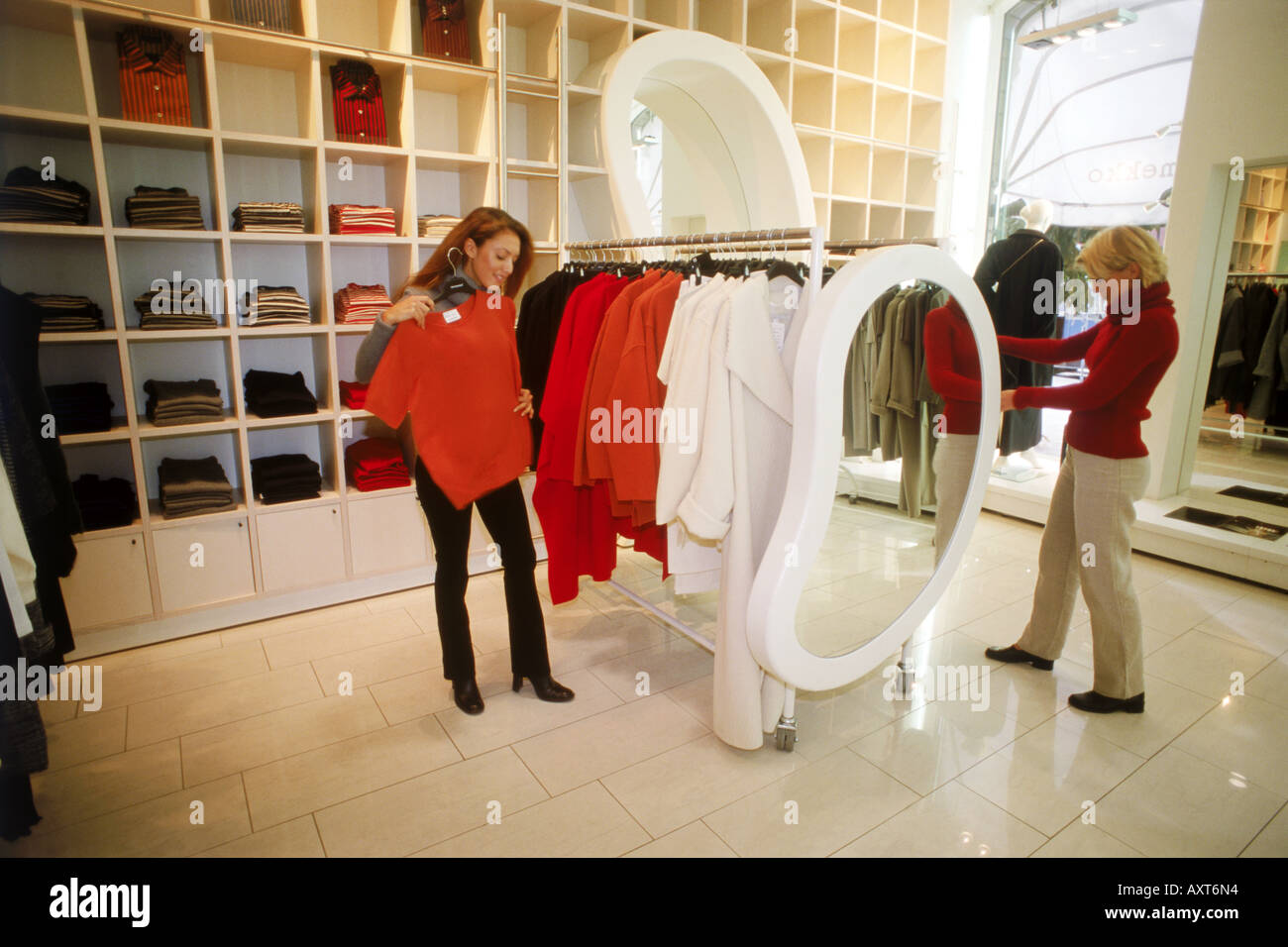 Women shopping together in clothing store in Stockholm Stock Photo - Alamy