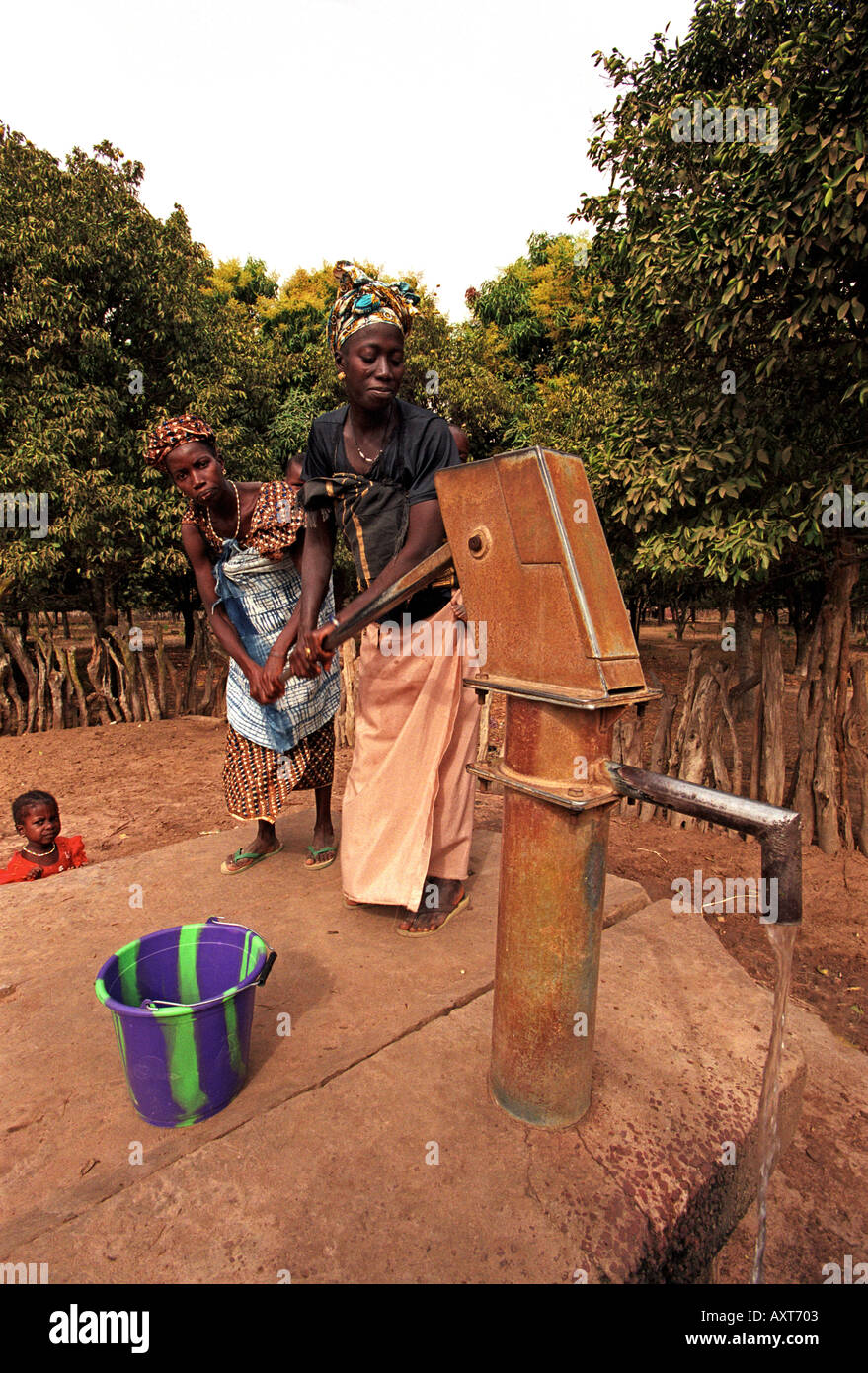 An African woman collecting water in The Gambia West Africa Stock Photo ...