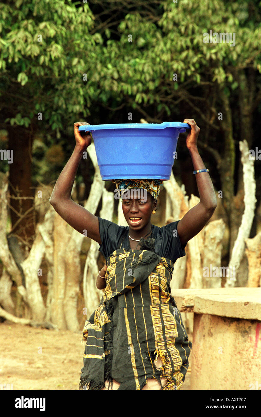 An African woman collecting water in The Gambia West Africa Stock Photo ...