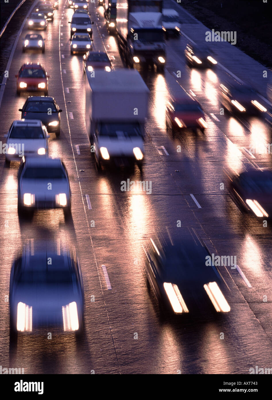 Traffic at night on motorway Stock Photo - Alamy