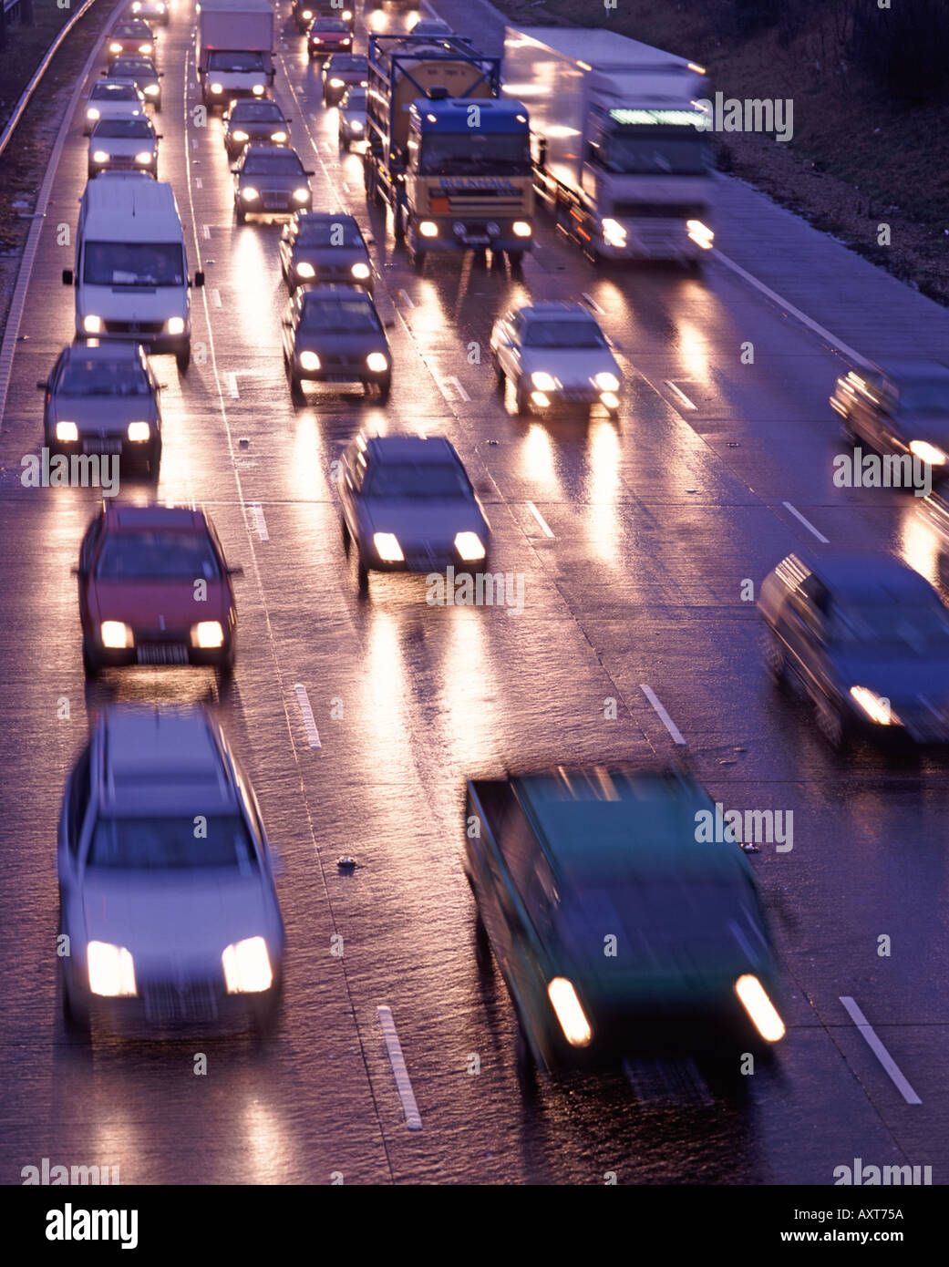 Traffic at night on motorway Stock Photo - Alamy
