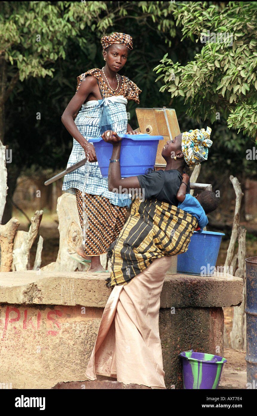 An African woman collecting water in The Gambia West Africa Stock Photo ...