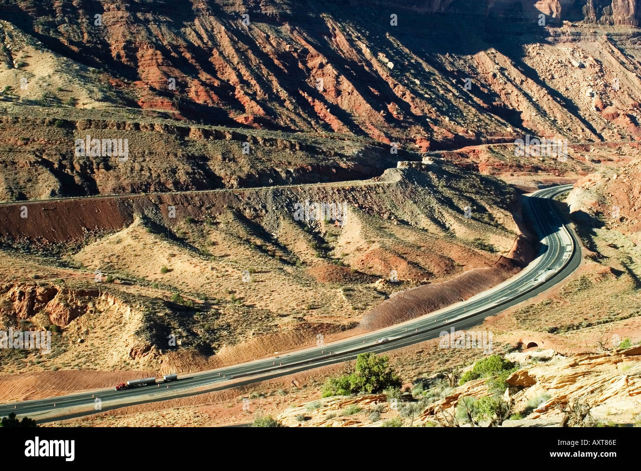 Curved road on desert mountain Stock Photo - Alamy