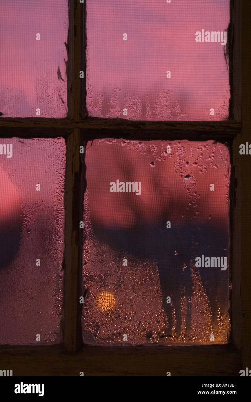 Sunset through window Stock Photo - Alamy