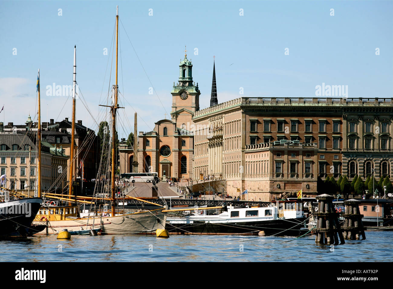 A ferry at dock with historic buildings in background Stock Photo - Alamy