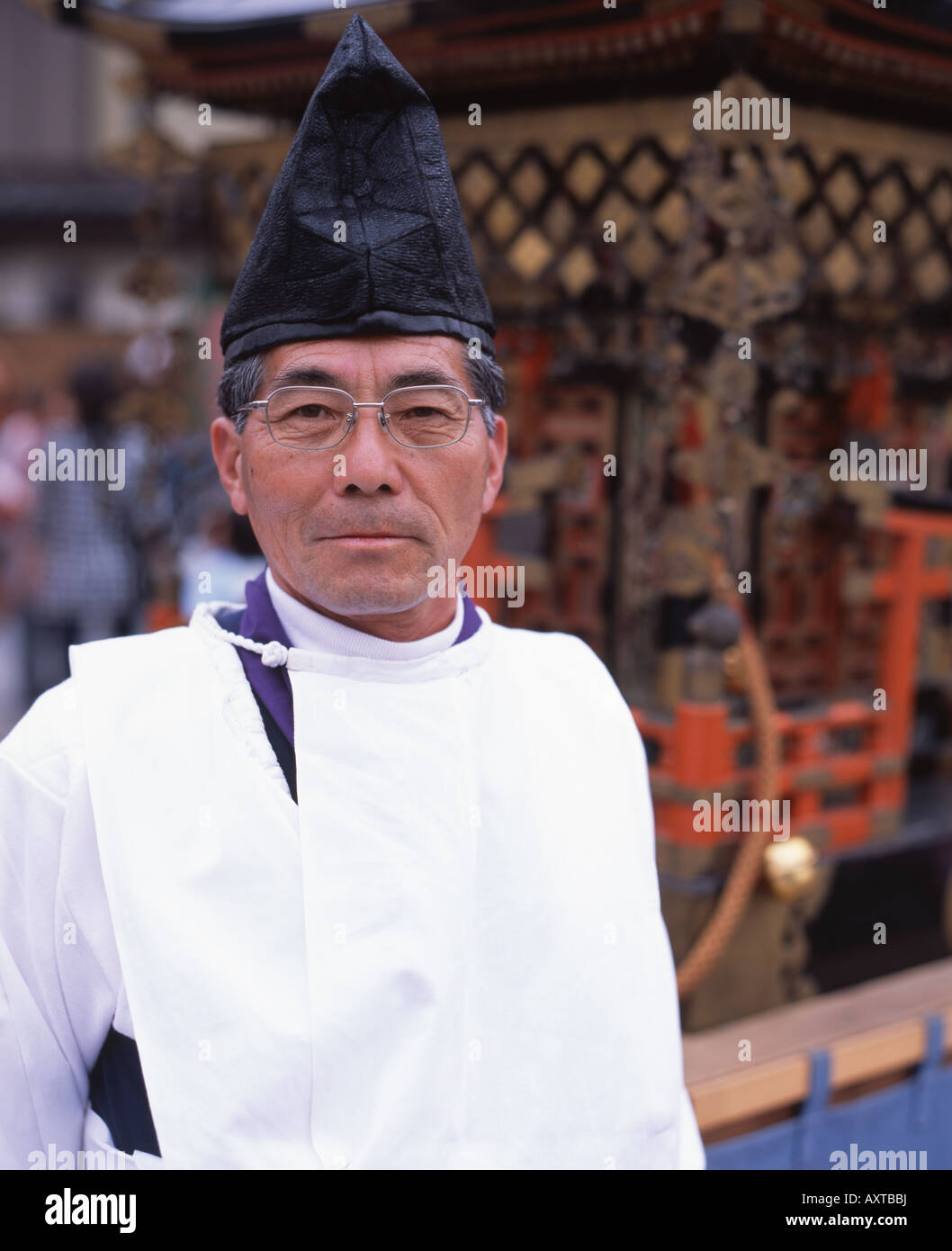 Shinto priest with mikoshi at Okkawa Festival Stock Photo - Alamy