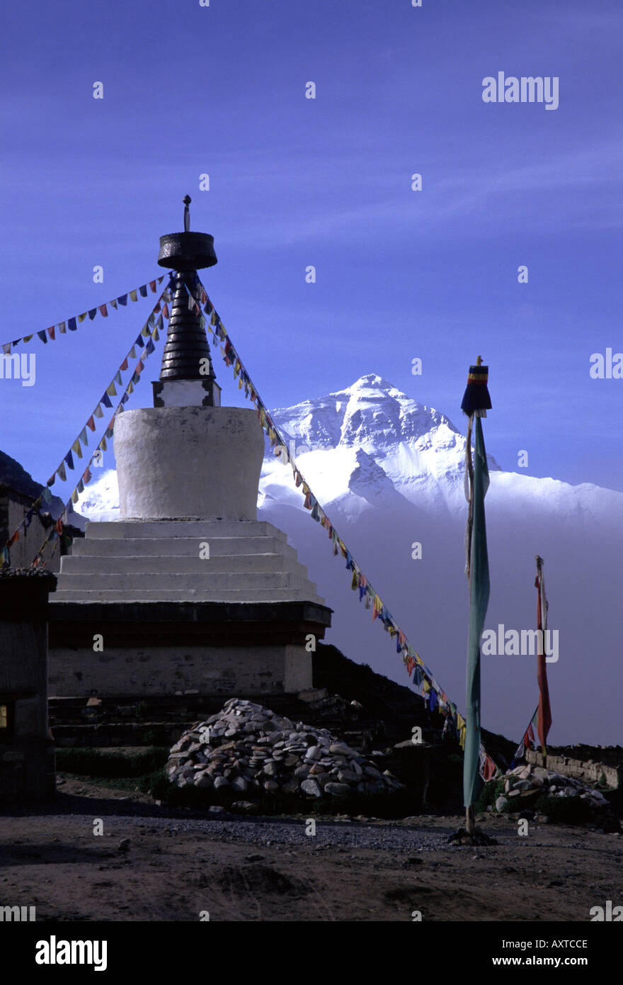 Mount Everest rising behind a stupa from the Rongbuk Monastery near ...