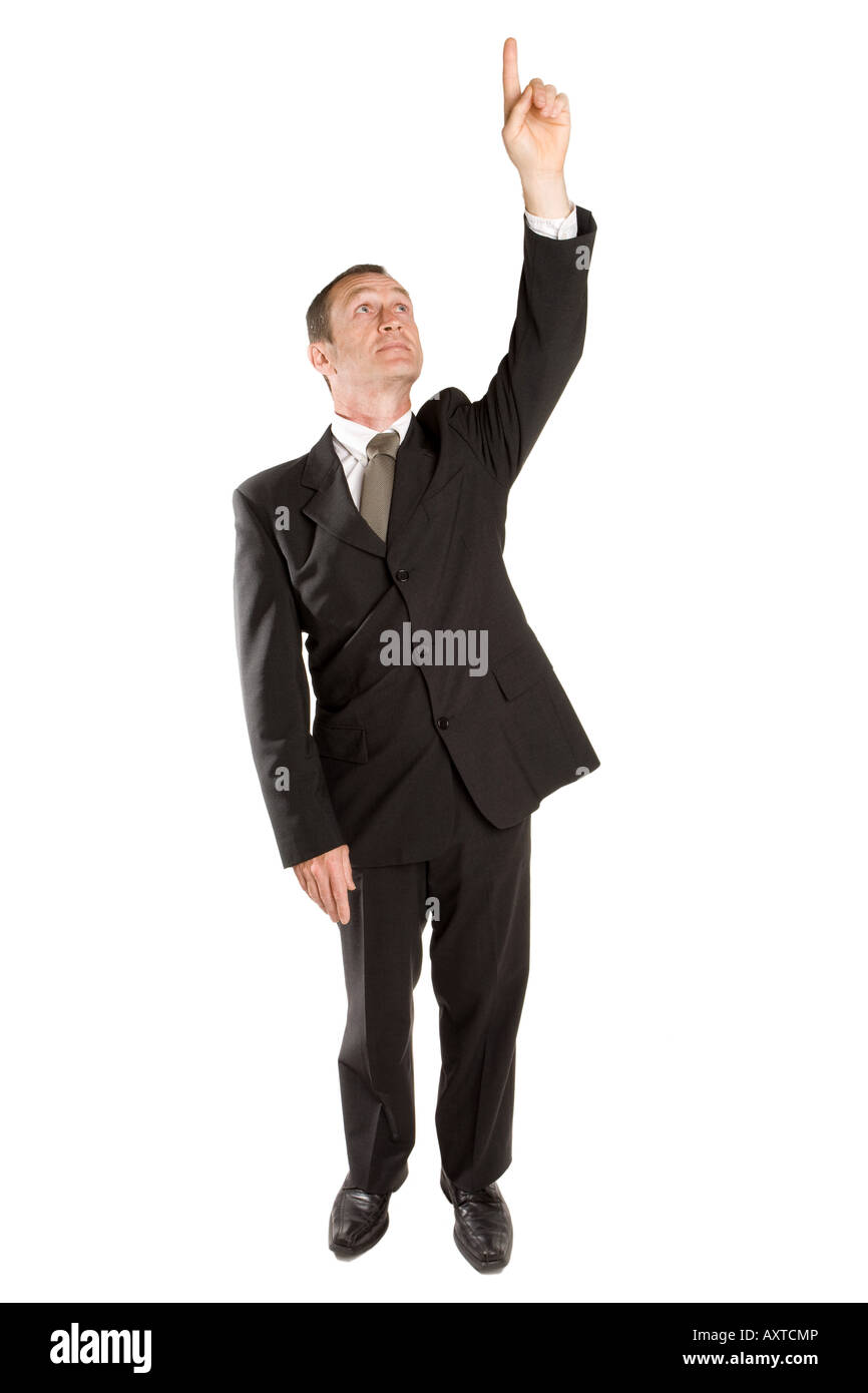 Business man standing in a black suit showing the top direction on the ...