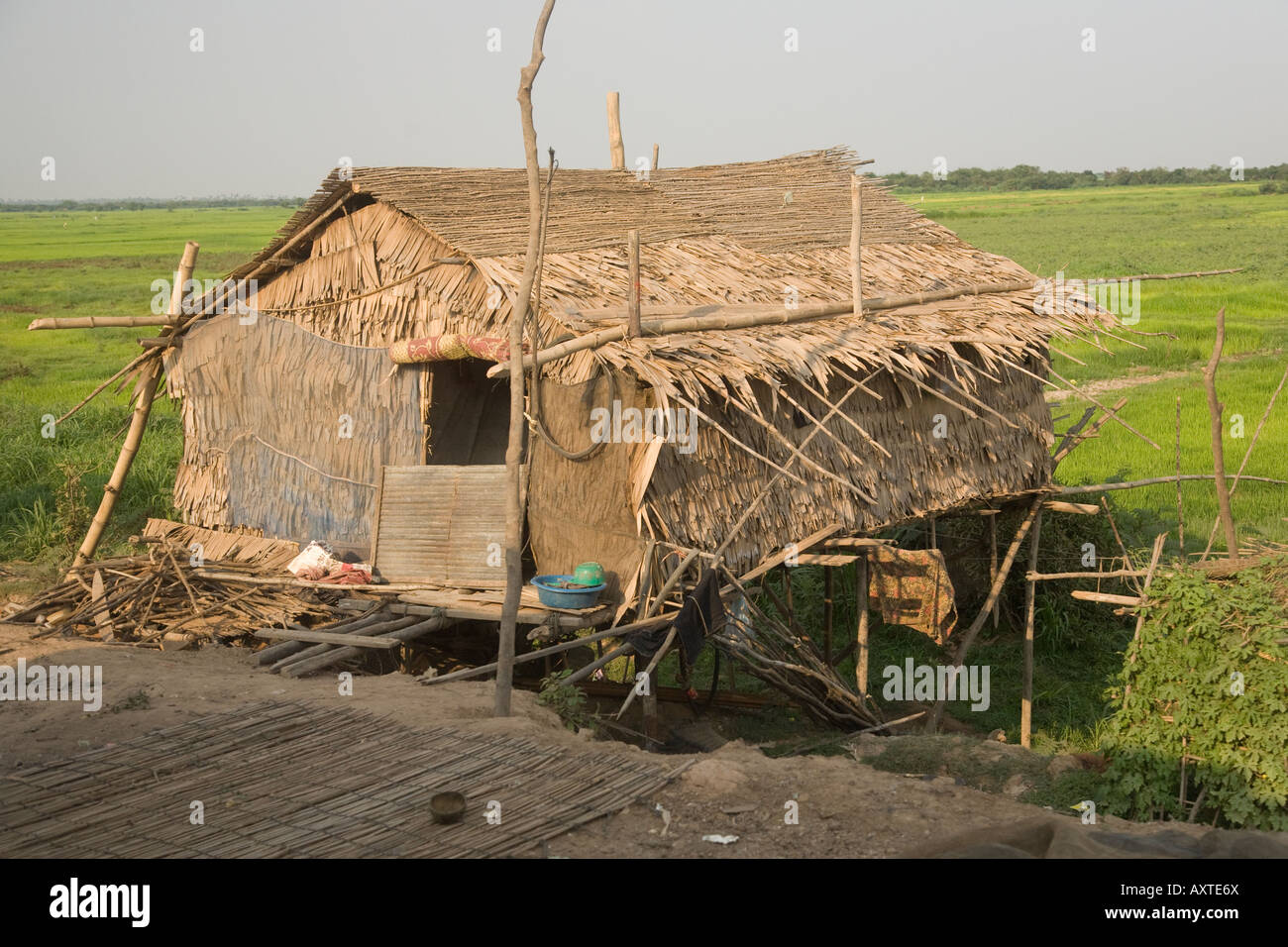 A straw and bamboo hut typical of rural Cambodia Stock Photo - Alamy