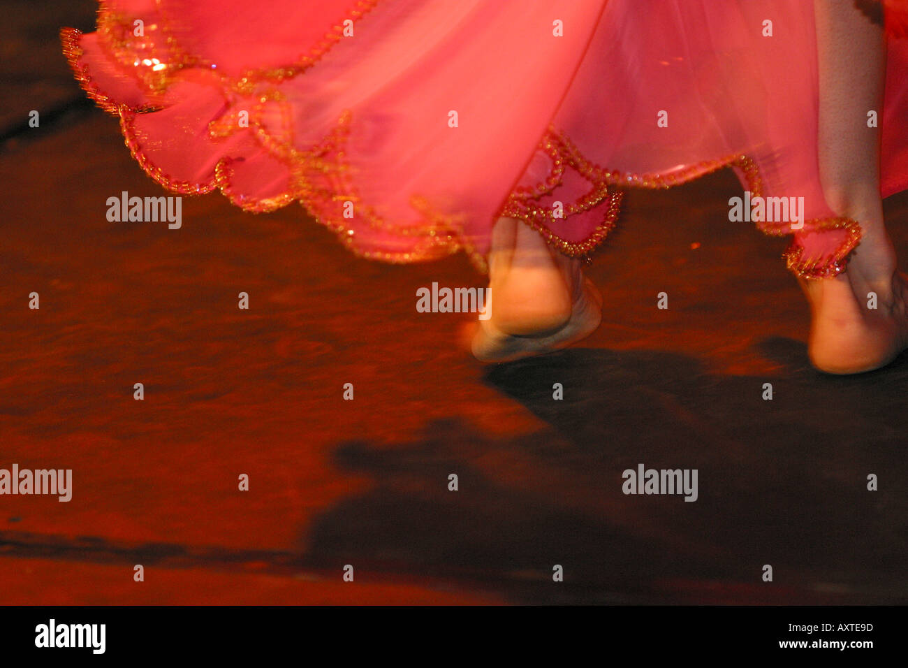 Belly Dancer performing at on stage. bare feet barefoot dance Stock ...