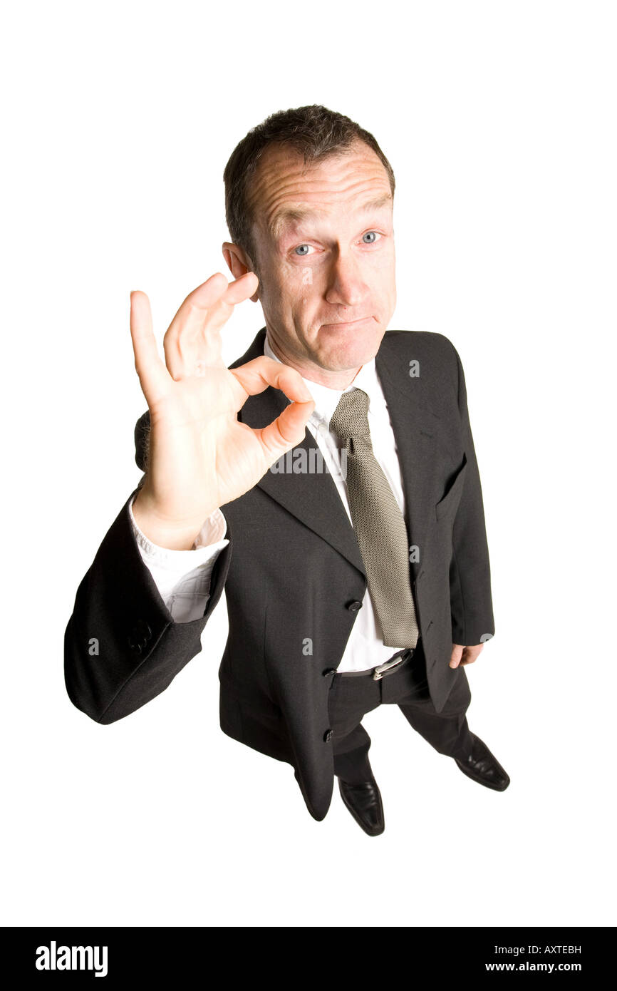Business man standing in a black suit making a perfect round with his ...