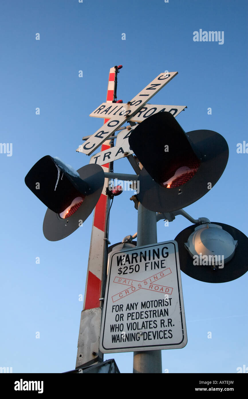 Railroad crossing gates Stock Photo - Alamy