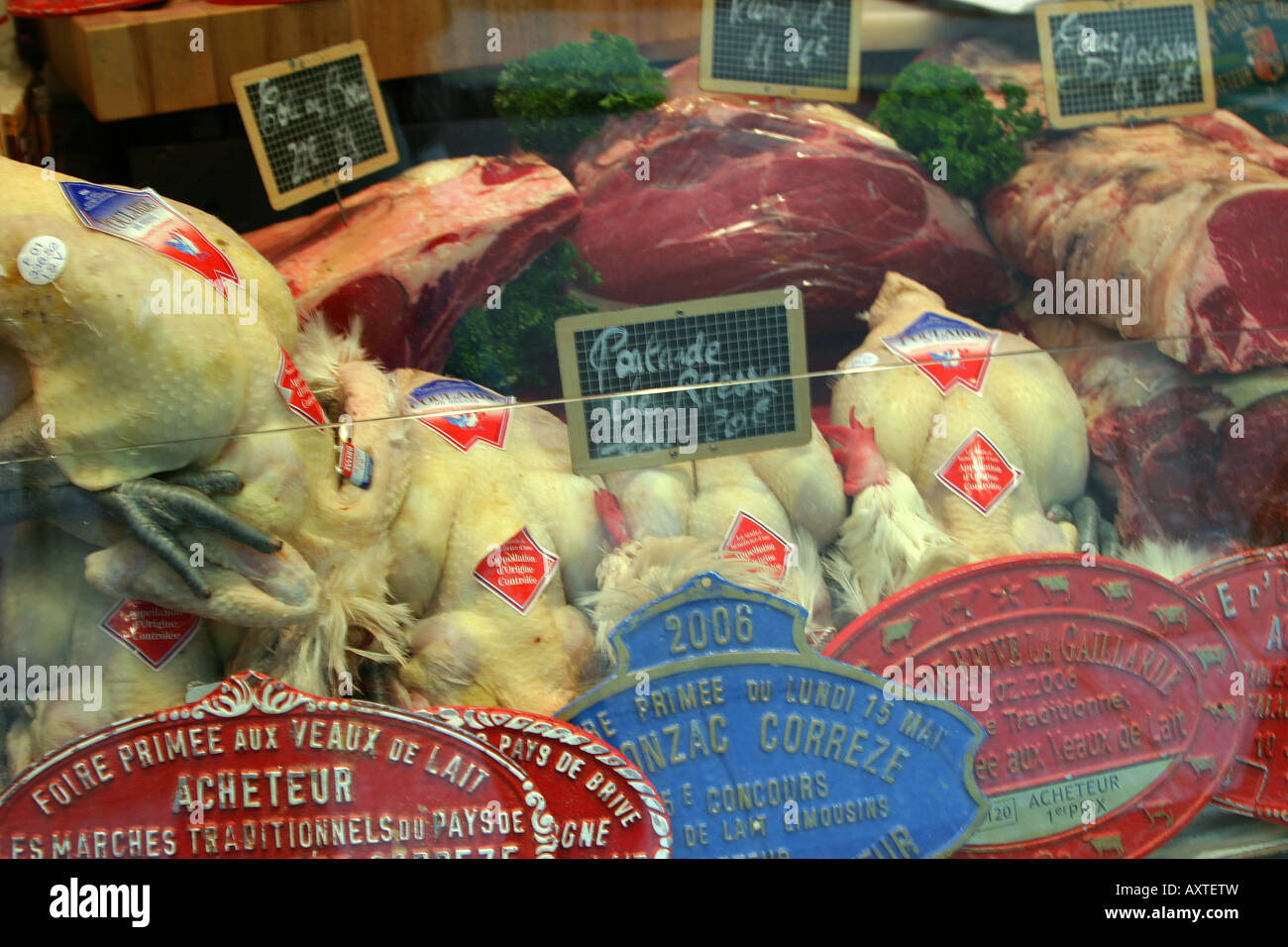 Butchers shop window Stock Photo - Alamy