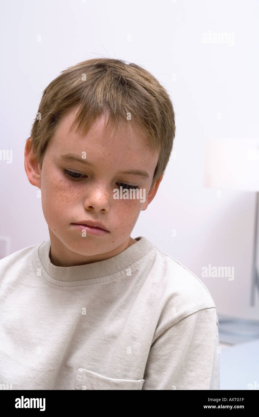 Portrait of a sad boy Stock Photo - Alamy