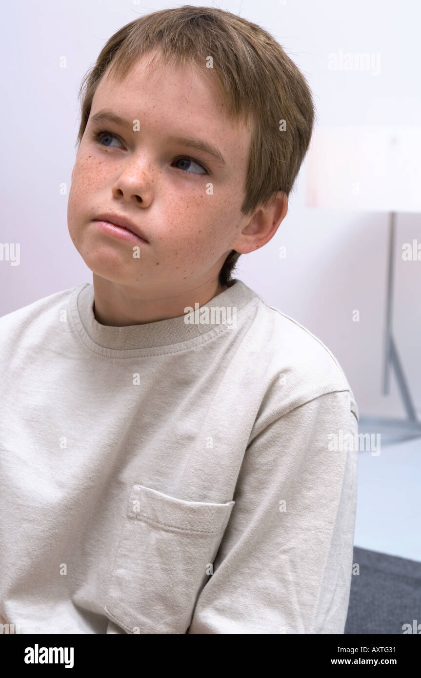 Portrait of a boy thinking Stock Photo - Alamy