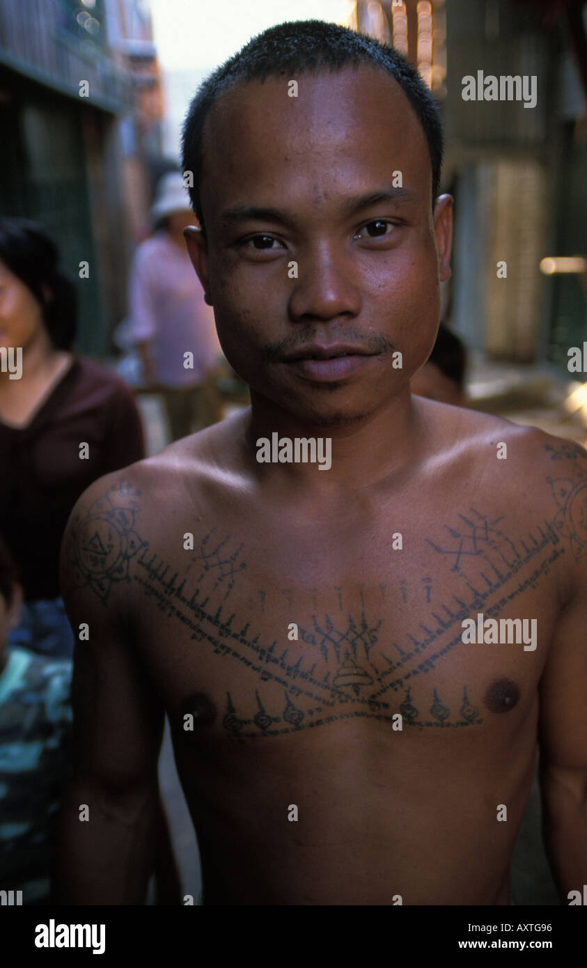 Phnom Penh tattooed boy from the backstreets Stock Photo - Alamy