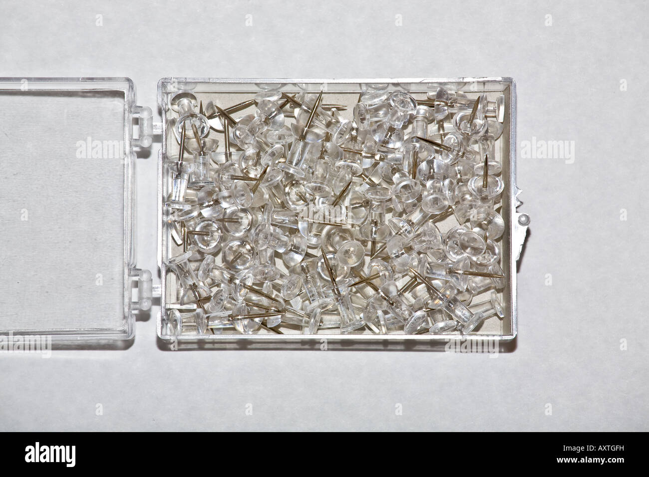 Box of clear push-pins Stock Photo - Alamy