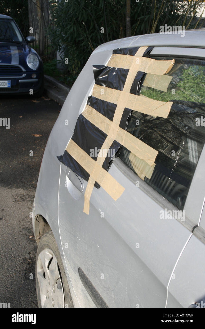 temporary repair for broken car window Stock Photo - Alamy
