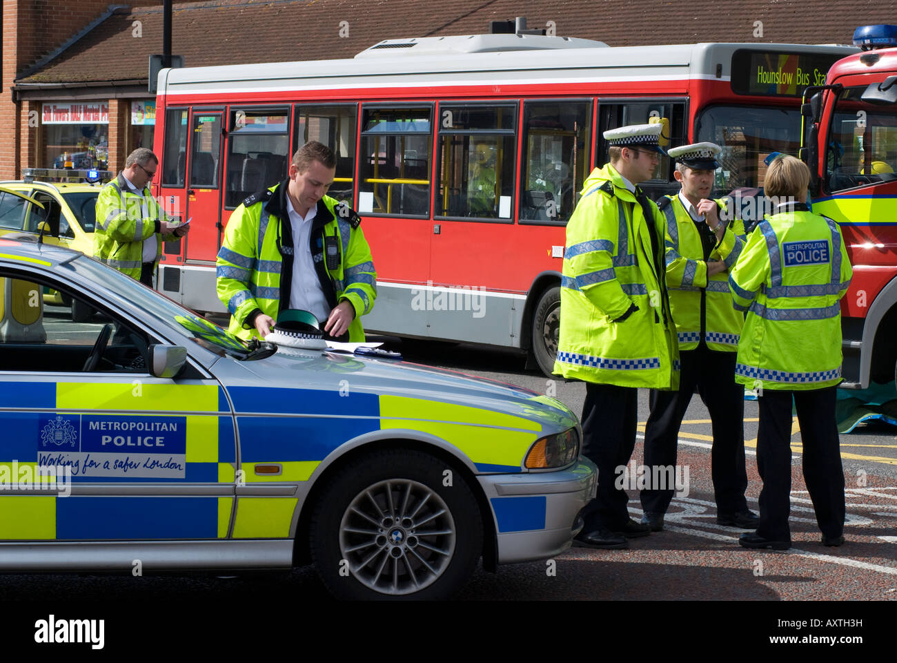 Emergency services on the scene at a road traffic accident Hounslow ...