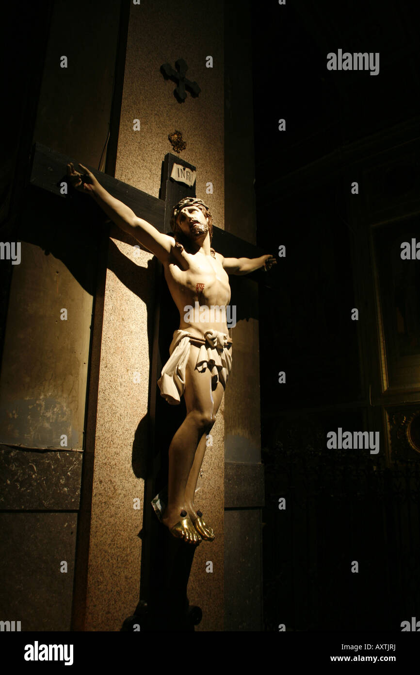 jesus on cross statue in church in rome italy Stock Photo - Alamy