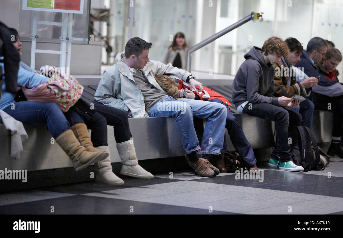 Delayed passengers at Munich airport Stock Photo - Alamy