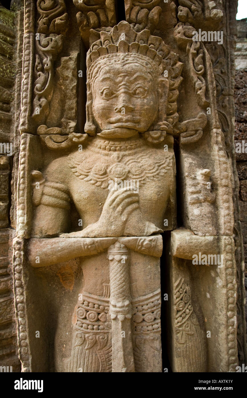 A statue of a soldier carved in stone at Angkor Wat, Cambodia Stock ...