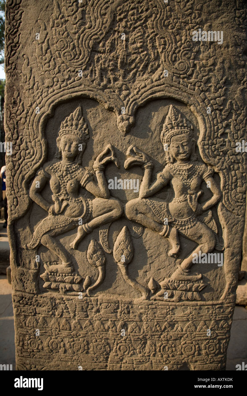 A carving of two women dancing in Angkor Wat Cambodia Stock Photo - Alamy