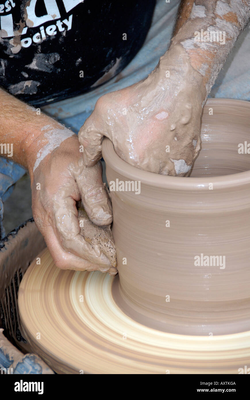 Pottery artist making a clay vase Stock Photo - Alamy