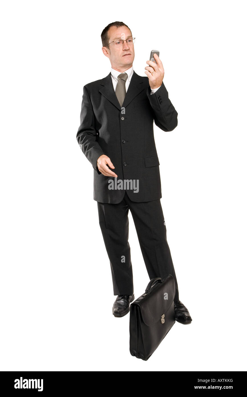 Man in suit checking Cut Out Stock Images & Pictures - Alamy