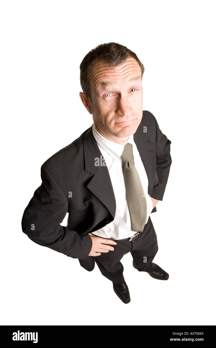 Business man standing in a black suit with a surprised face. The view ...