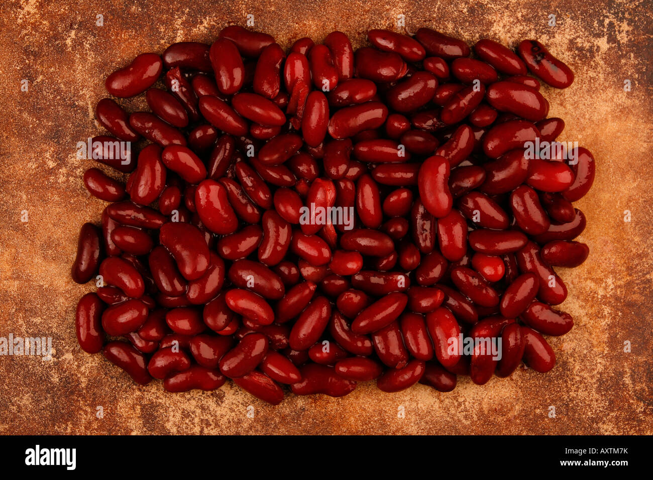 Kidney beans on a rustic background Stock Photo - Alamy