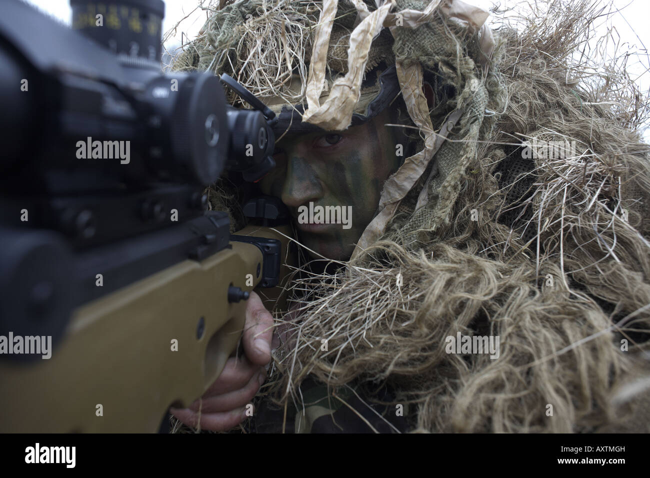 British Army Infantry soldiers demonstrate their newest L115A3 sniper ...