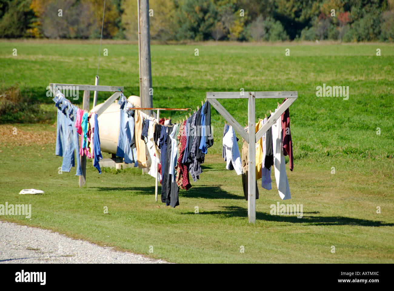 Clothes wash day and wet clothes hanging on a clothes line for drying ...