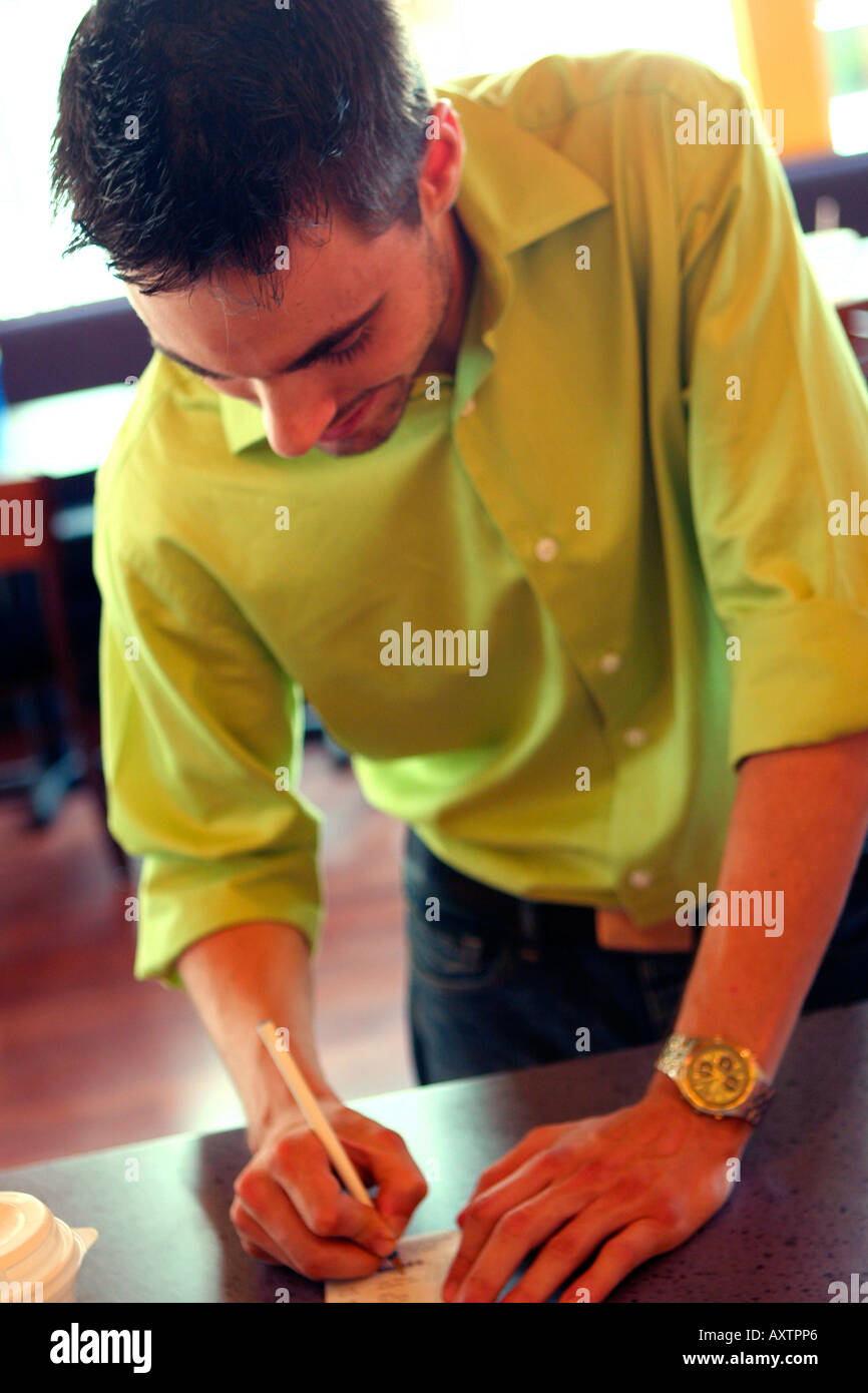 Signing bill restaurant hi-res stock photography and images - Alamy
