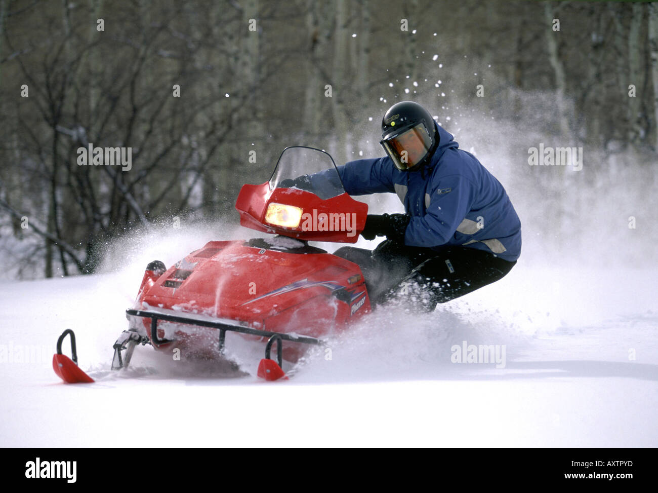 Snowmobiler turning with control hi-res stock photography and images ...