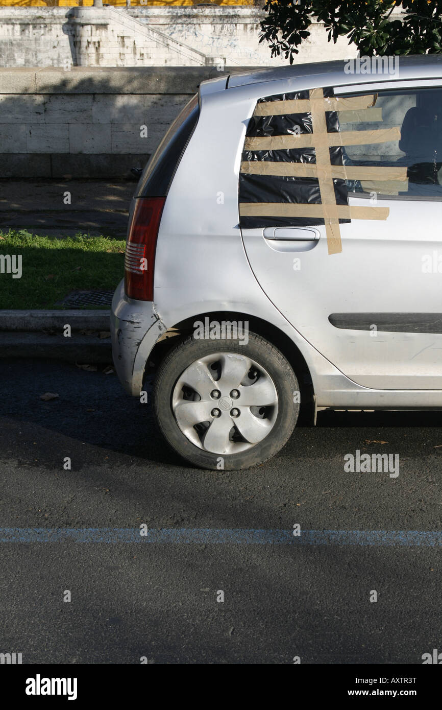 temporary repair for broken car window Stock Photo - Alamy