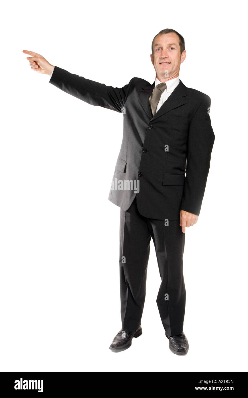 Business man standing in a black suit showing the left direction with ...