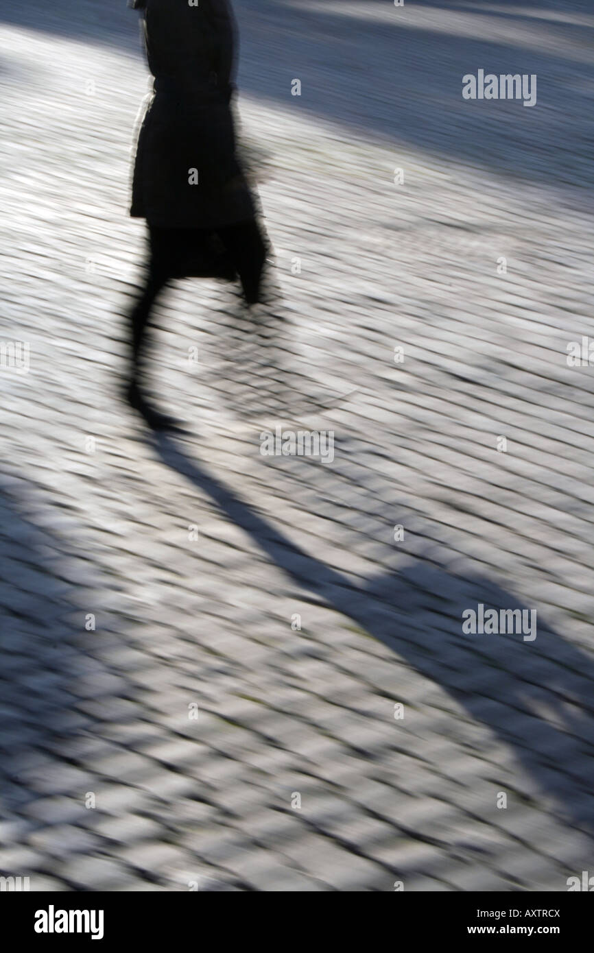 female commuter running fast in town Stock Photo - Alamy