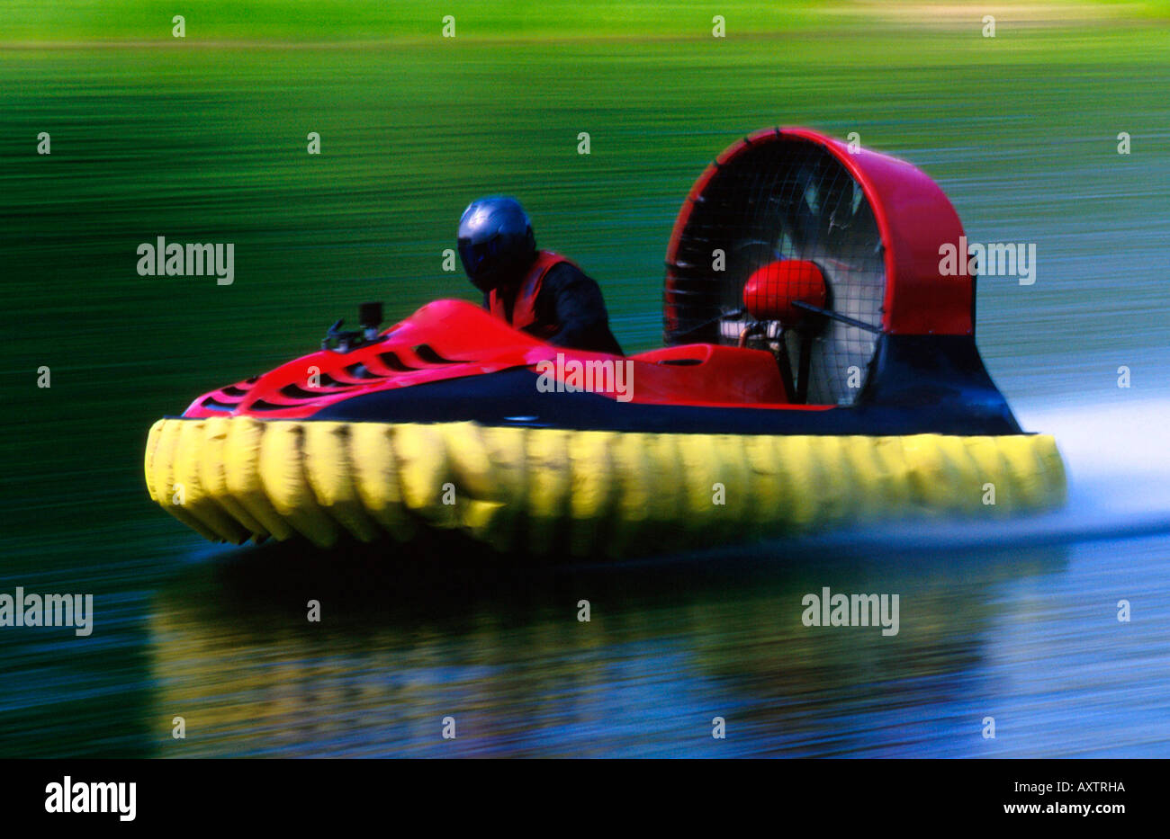 Side profile of a person riding a hovercraft Stock Photo - Alamy