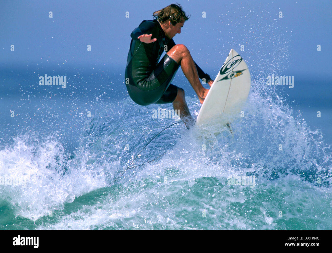 Side profile of a man surfing hi-res stock photography and images - Alamy