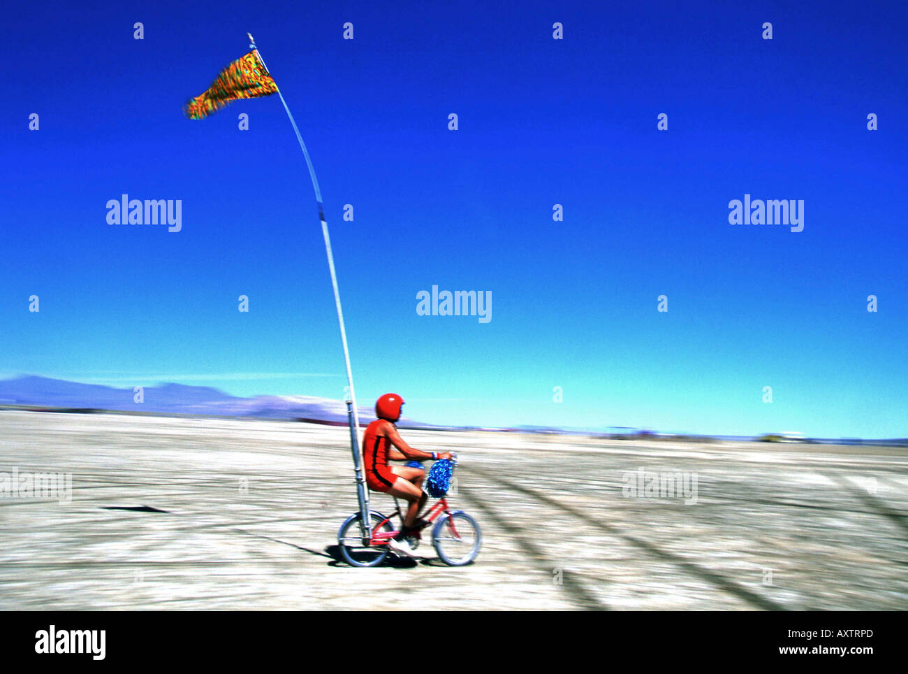 Side profile of a person on bicycle Stock Photo - Alamy