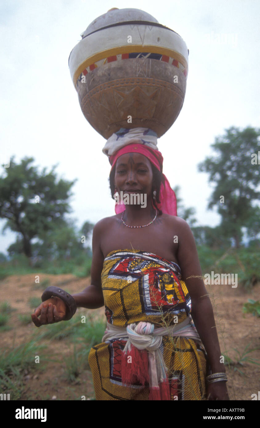 Female fulani carrying a calabash on her head Stock Photo - Alamy