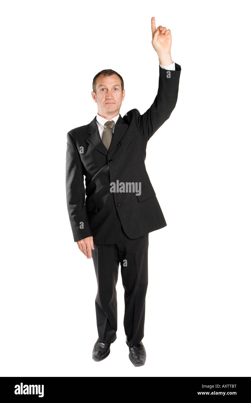 Business man standing in a black suit showing the top direction on the ...