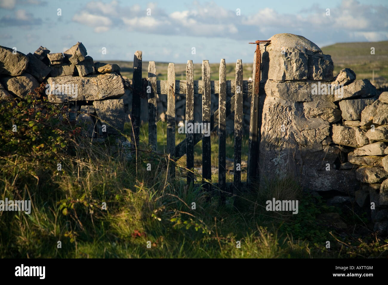 Gate with early morning sunlight Stock Photo - Alamy