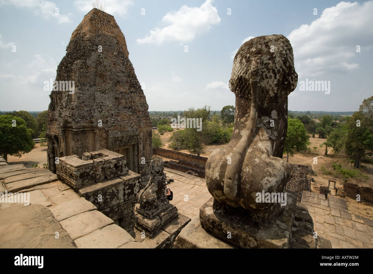 A stone lion statue guards Preah Rup Temple in Cambodia Stock Photo - Alamy
