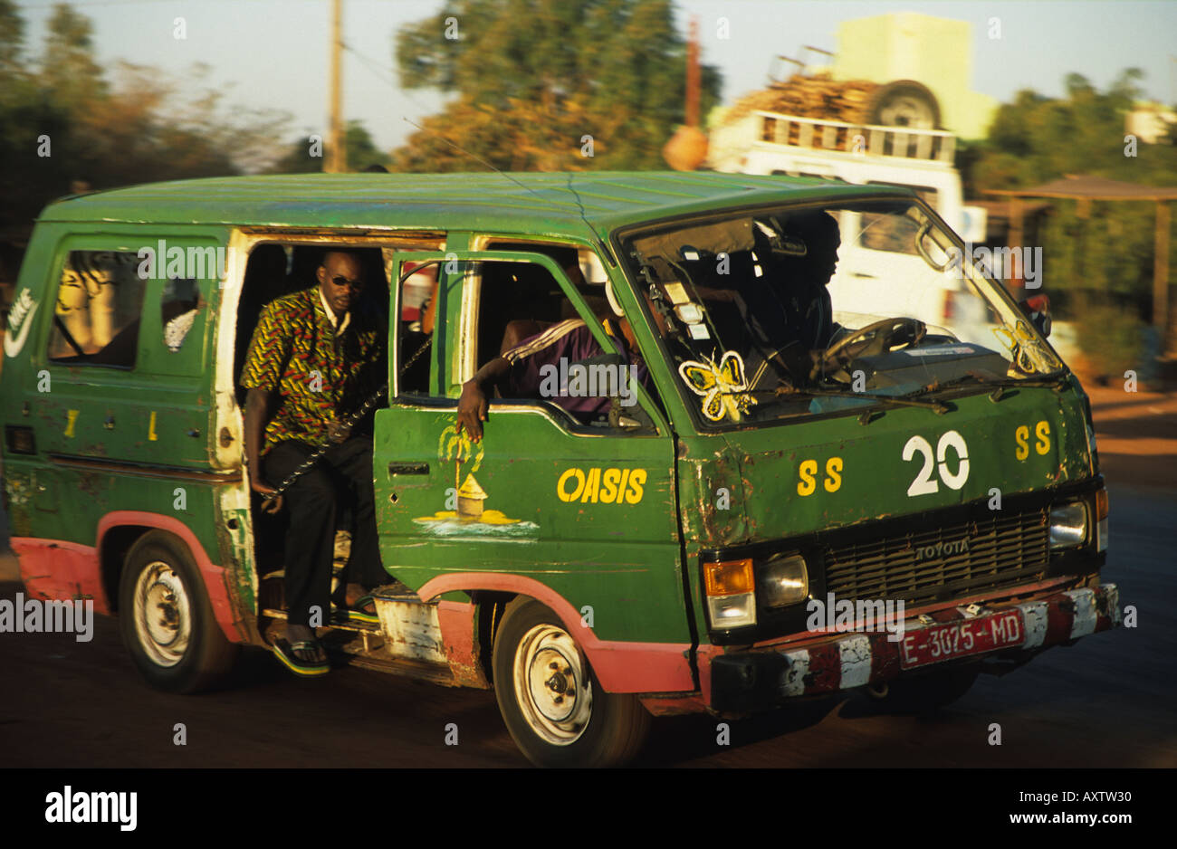 Local minibus taxi on the road out of Bamako, Mali, West Africa Stock ...
