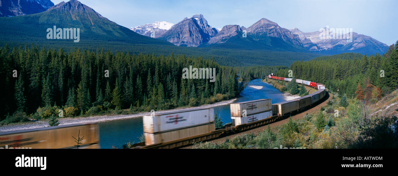 A freight train travelling through the Canadian Rockies at Morants ...