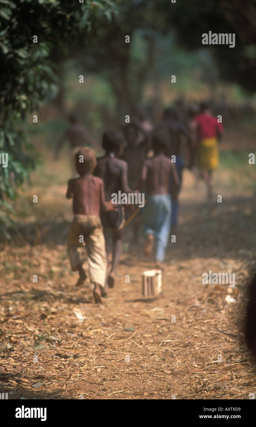 Children running with their backs to the camera Stock Photo - Alamy