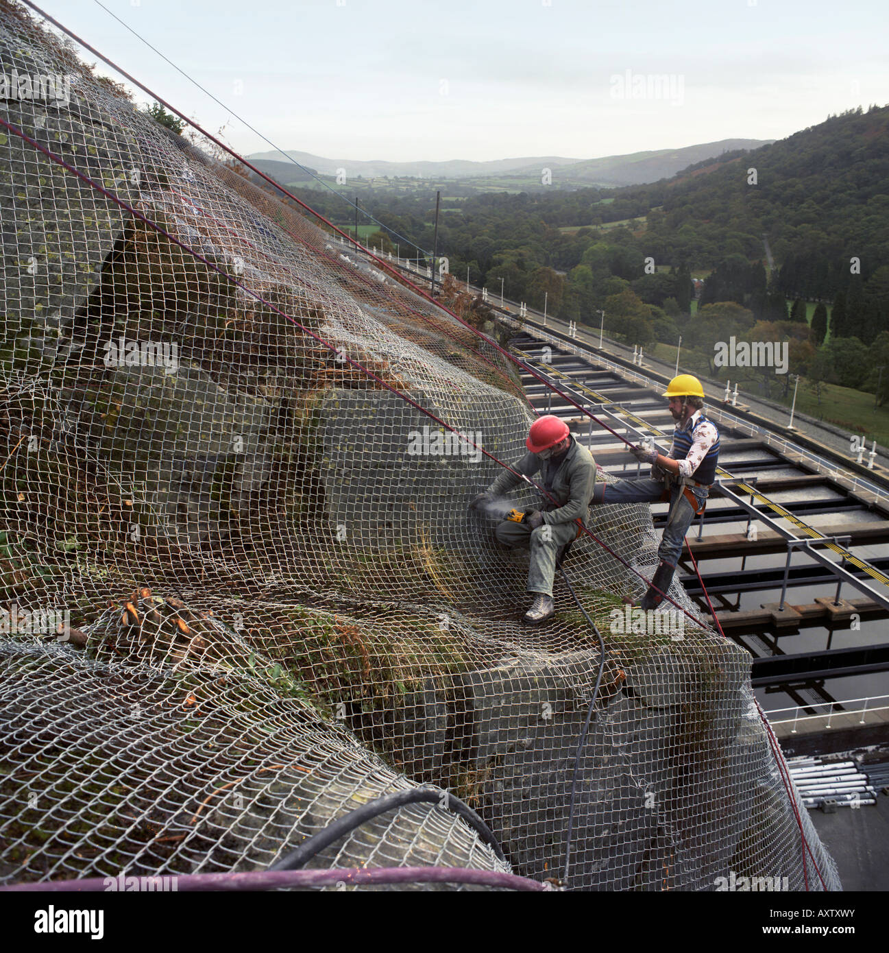 Rock bolting of cliff face to protect water treatment plant below from ...